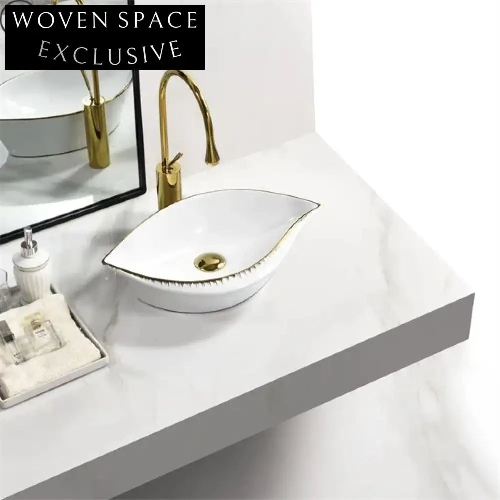 Elegant Gold Ceramic Oval Countertop Wash Basin with Golden Line Art ...